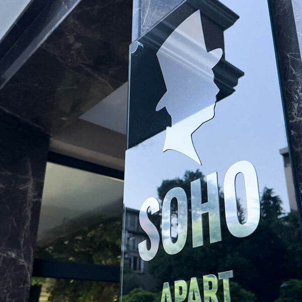 Elegant acrylic sign with stainless steel embossed letters - SOHO Apart ...